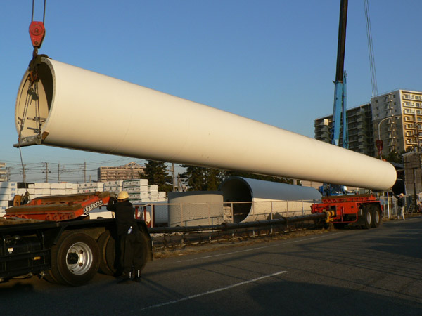 Transporting about 30 meters long construction by specialized trucks ...